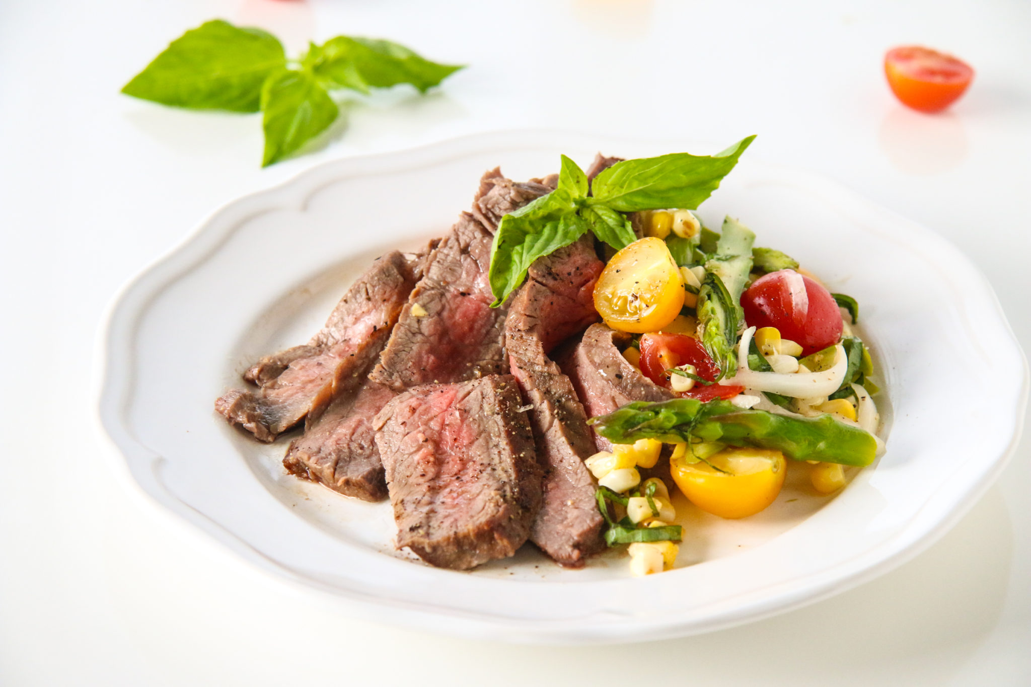 Marinated Flank Steak with Corn, Asparagus, and Tomato Salad | Chef ...